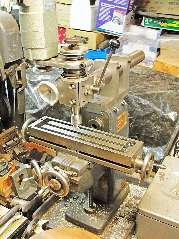 Childs 0000 horizontal milling machine with a Unimat vertical milling head