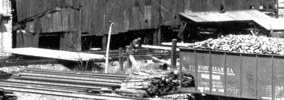 Image 2 - The Yard - at right - men grading rails at shed